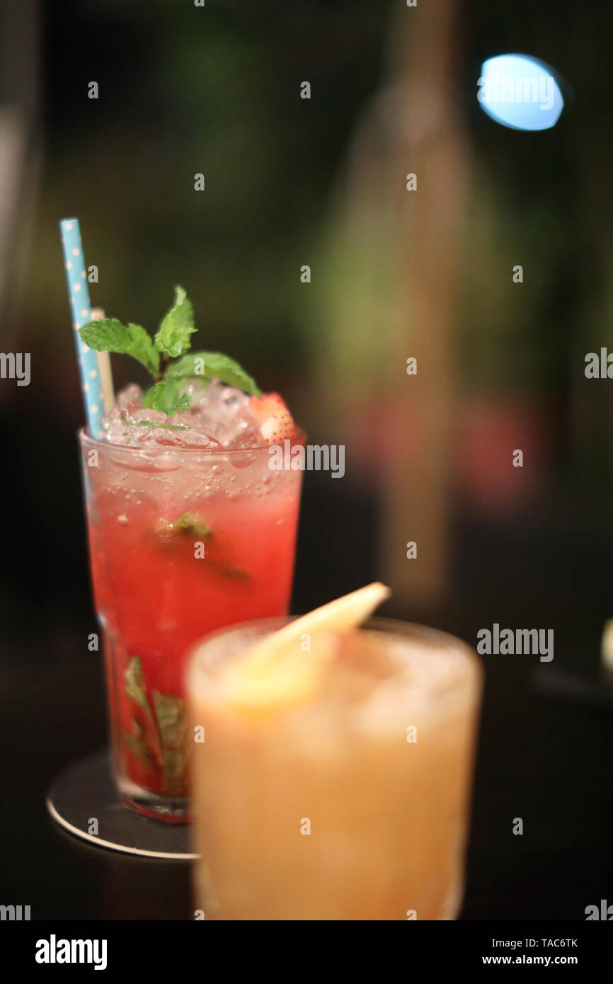 Red cocktail at bar Stock Photo - Alamy