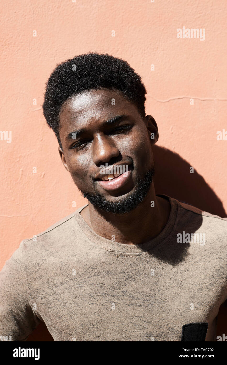 Portrait of a confident young man outdoors Stock Photo - Alamy