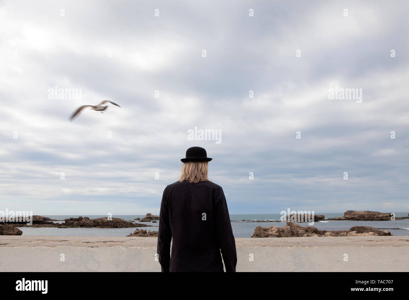 Rear view of a man wearing hat hi-res stock photography and images - Alamy