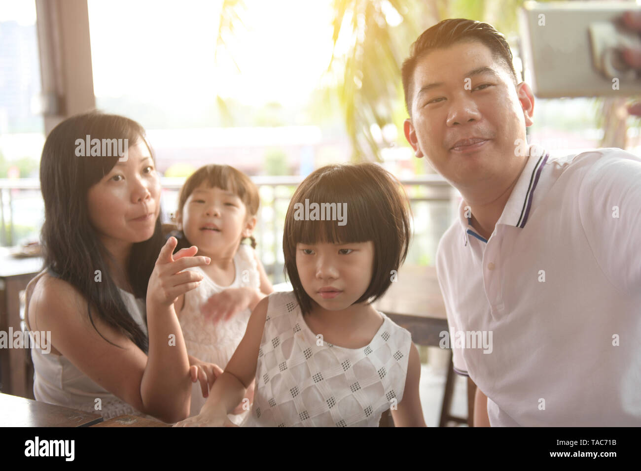 asian family taking selfie on outdoor Stock Photo - Alamy