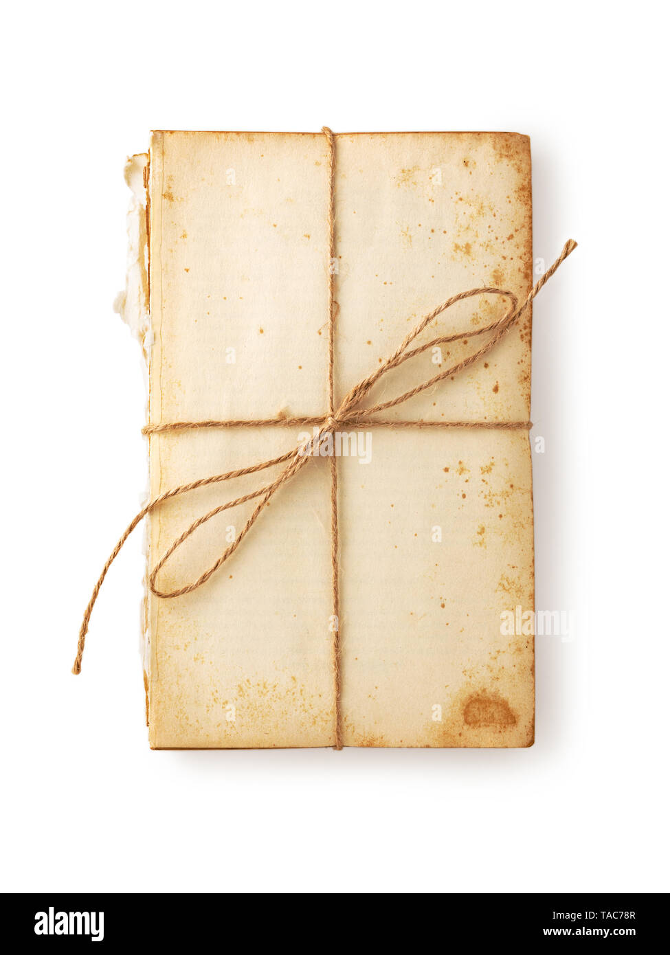 Old book paper with hemp string tied on white background Stock Photo ...