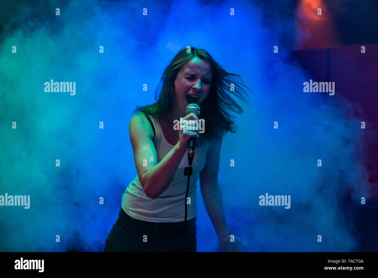 Female singer dark hair hi-res stock photography and images - Alamy