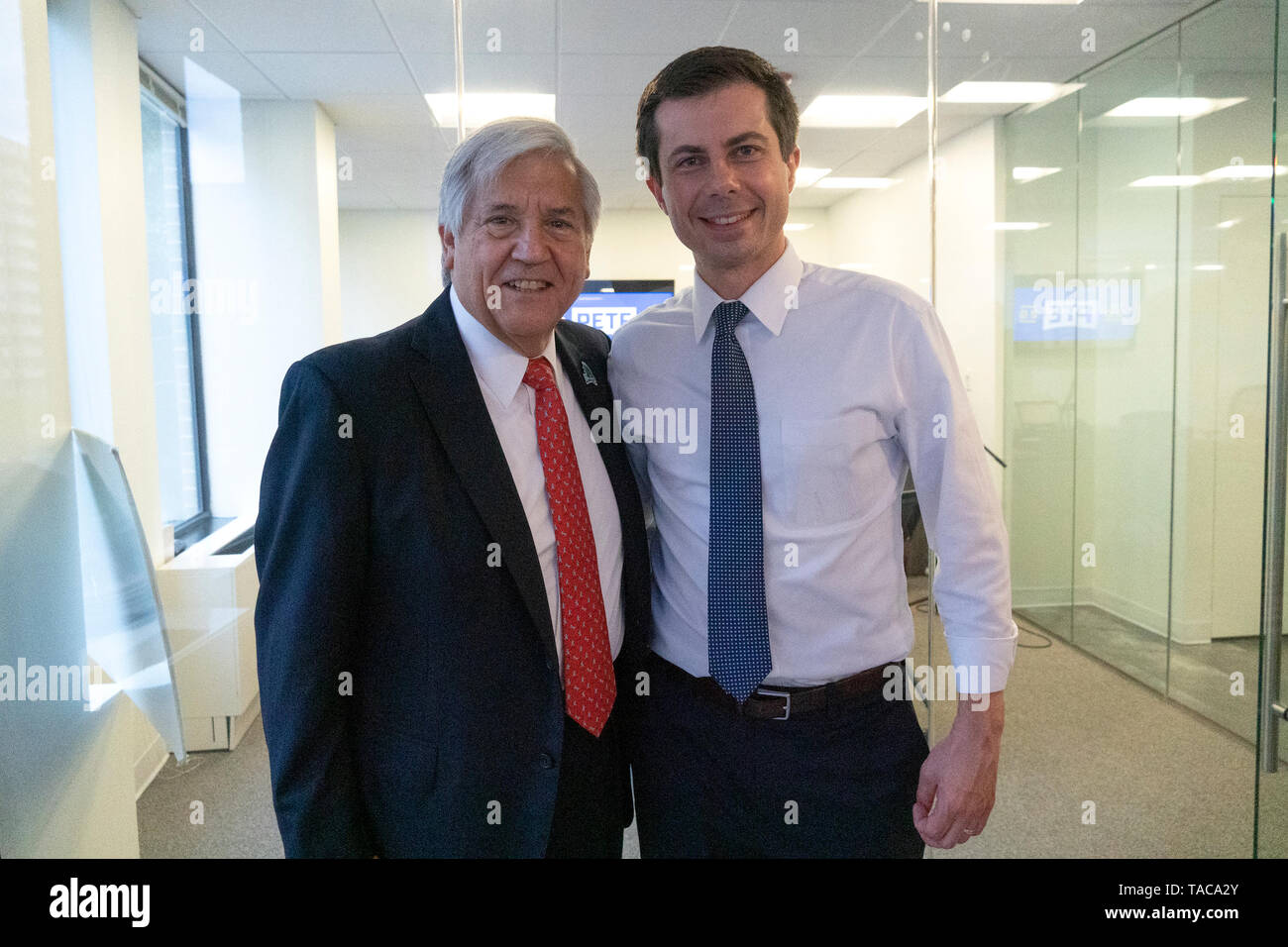 Mayor Pete Buttigieg takes a photo with Greg Rosenbaum, venture ...