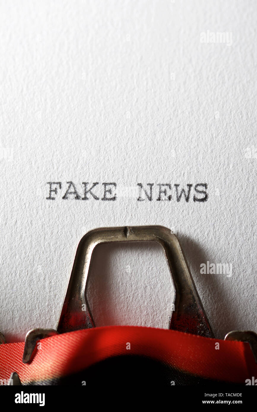 The sentence, Fake News, written with a typewriter Stock Photo - Alamy