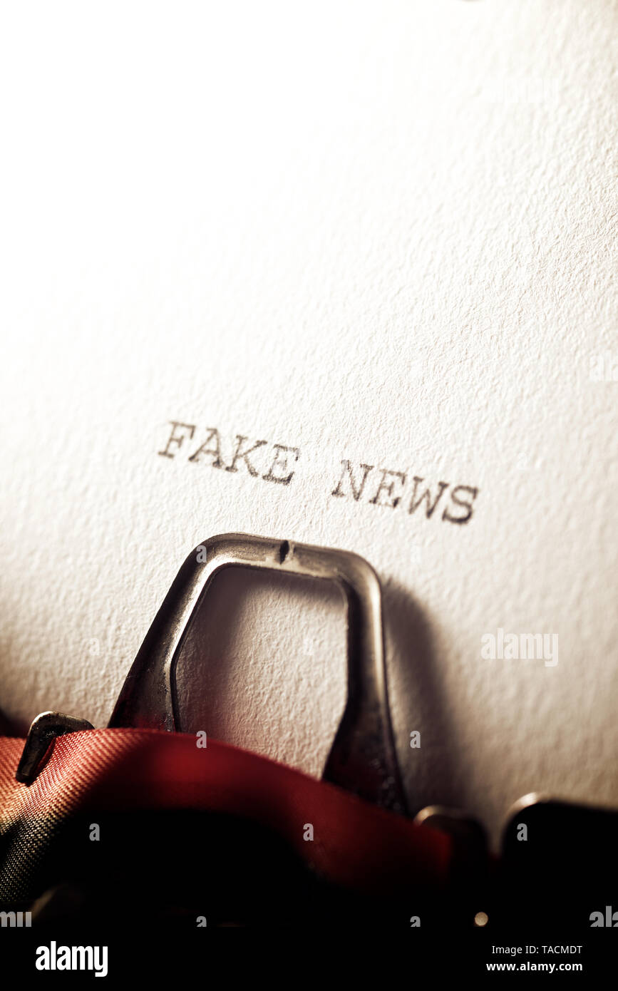 The sentence, Fake News, written with a typewriter Stock Photo - Alamy