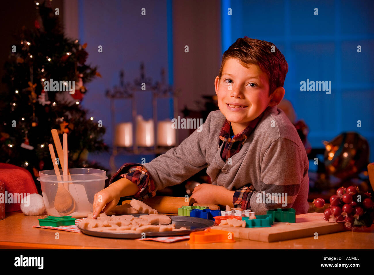 Little boy baking Christmas cookies at home Stock Photo - Alamy