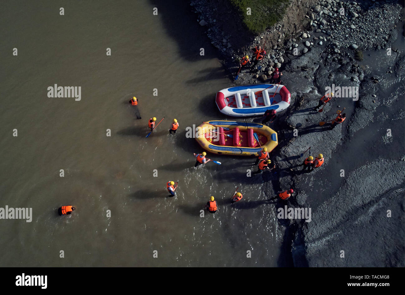 top view of rafting people in boats on the river Stock Photo - Alamy