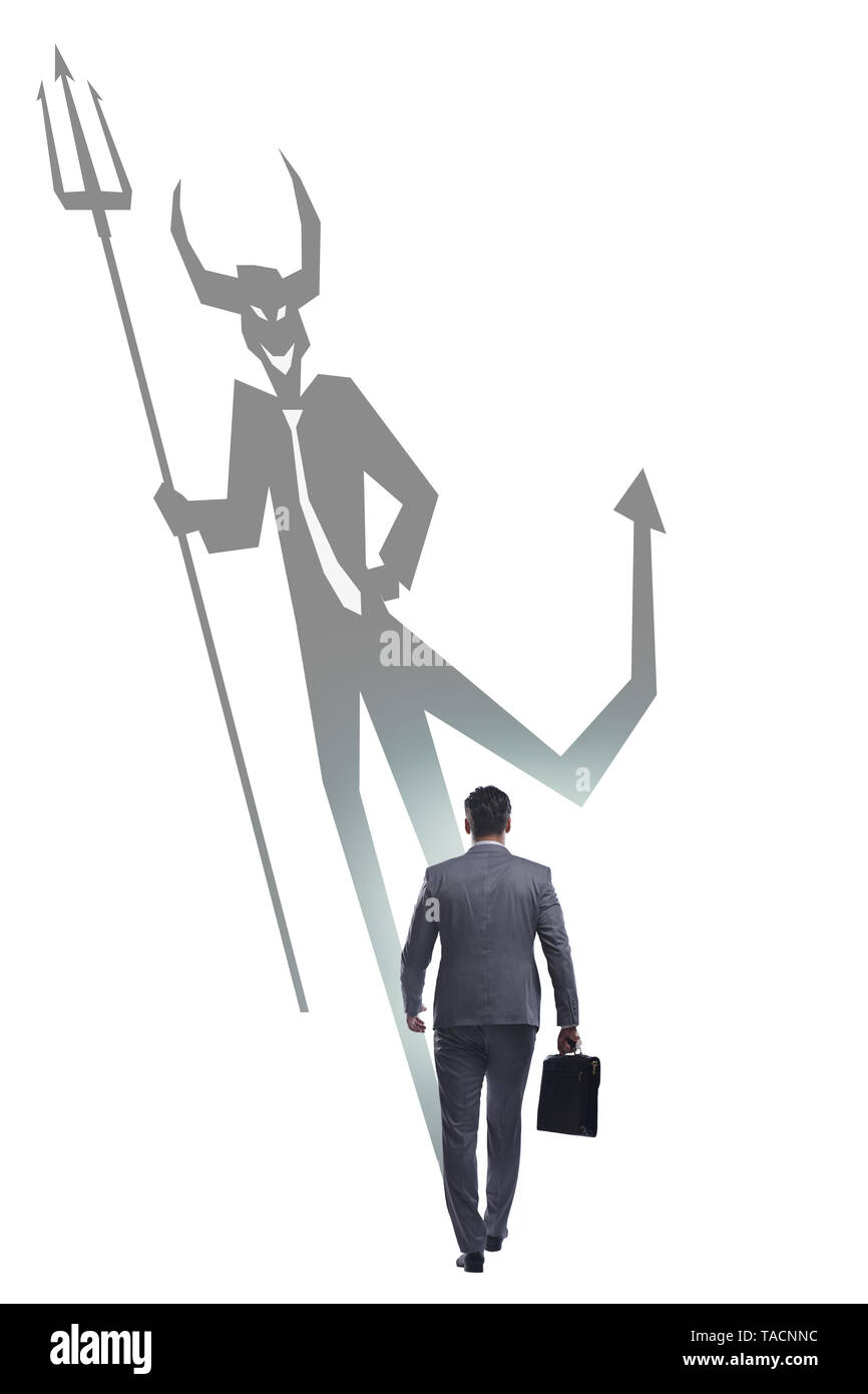 Devil hiding in the businessman - alter ego concept Stock Photo - Alamy