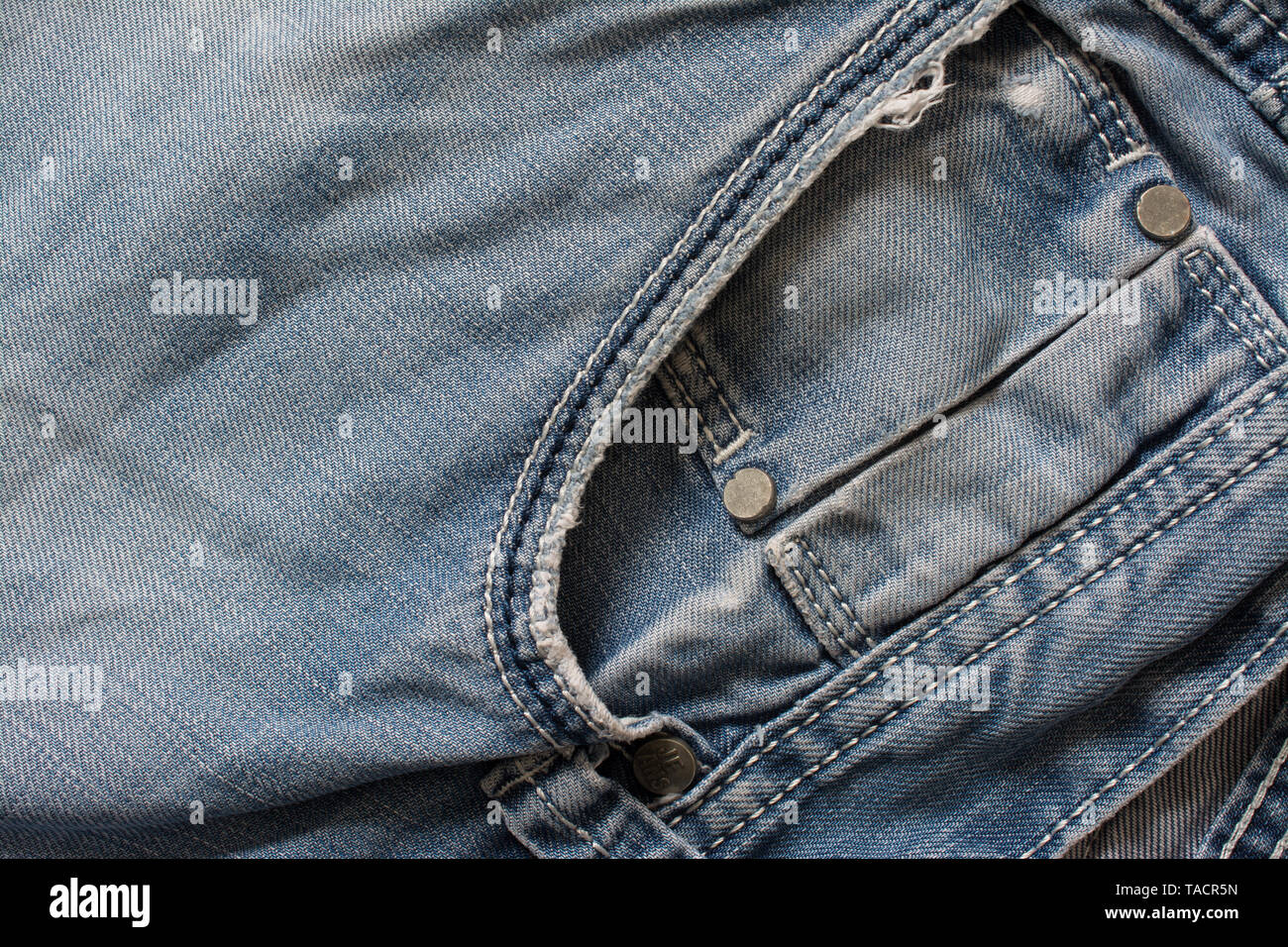 Denim jeans texture, cotton fabric. Pocket and rivet. Textile ...