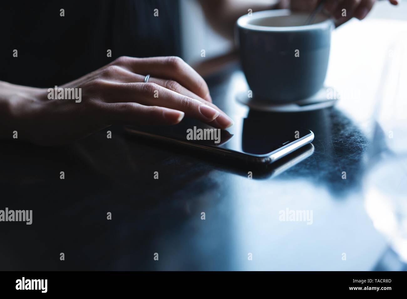 Close up of women's hands holding smartphone, female using mobile phone ...