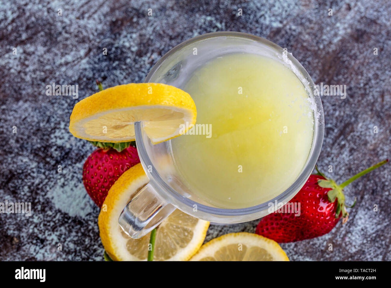 Lemonade with ice. Fresh lemonade with strawberry, mint shot top down ...