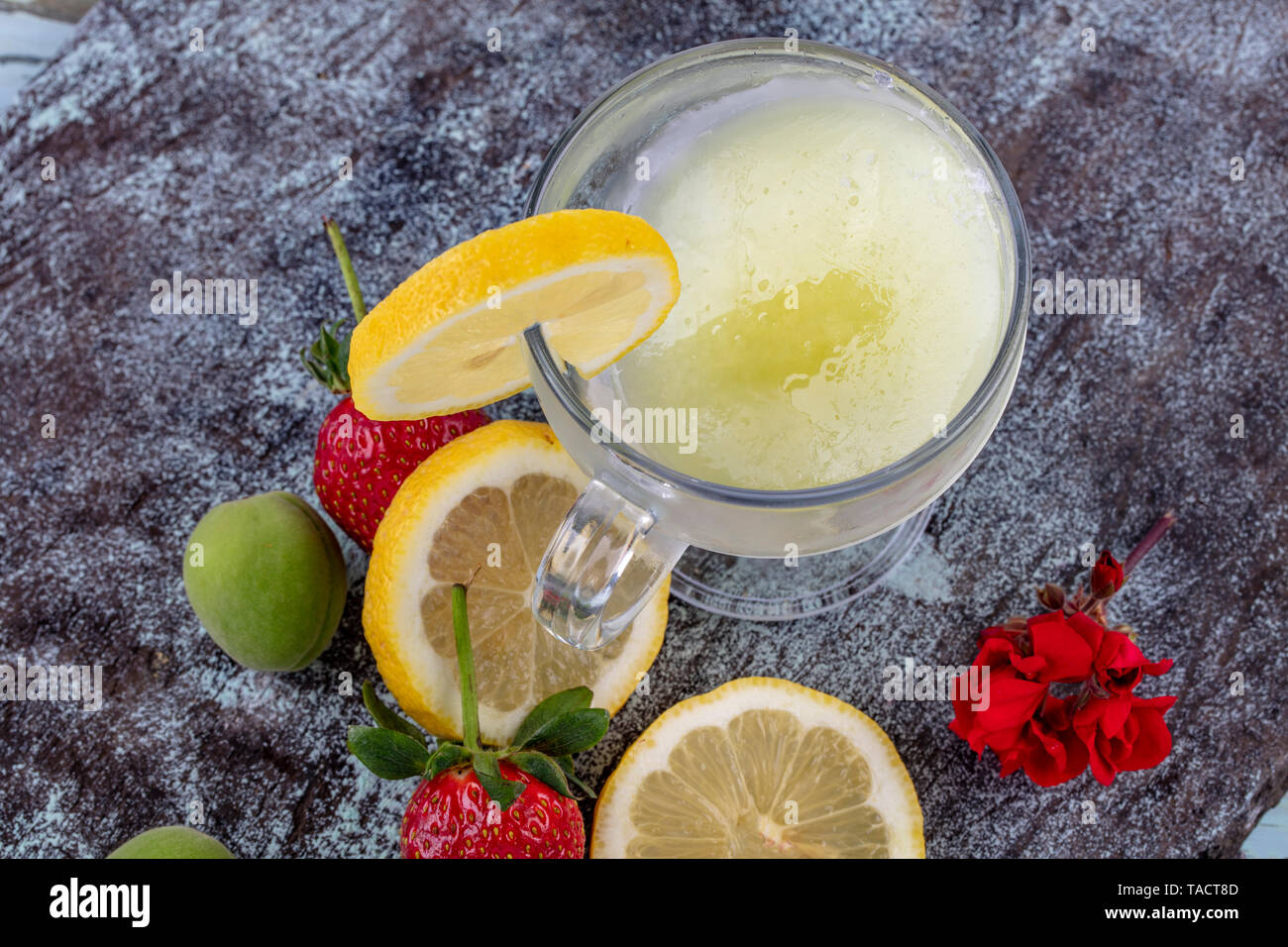 Lemonade with ice. Fresh lemonade with strawberry, mint shot top down ...