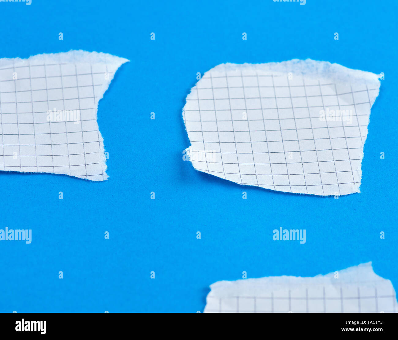 Ripped squared paper pieces hi-res stock photography and images - Alamy