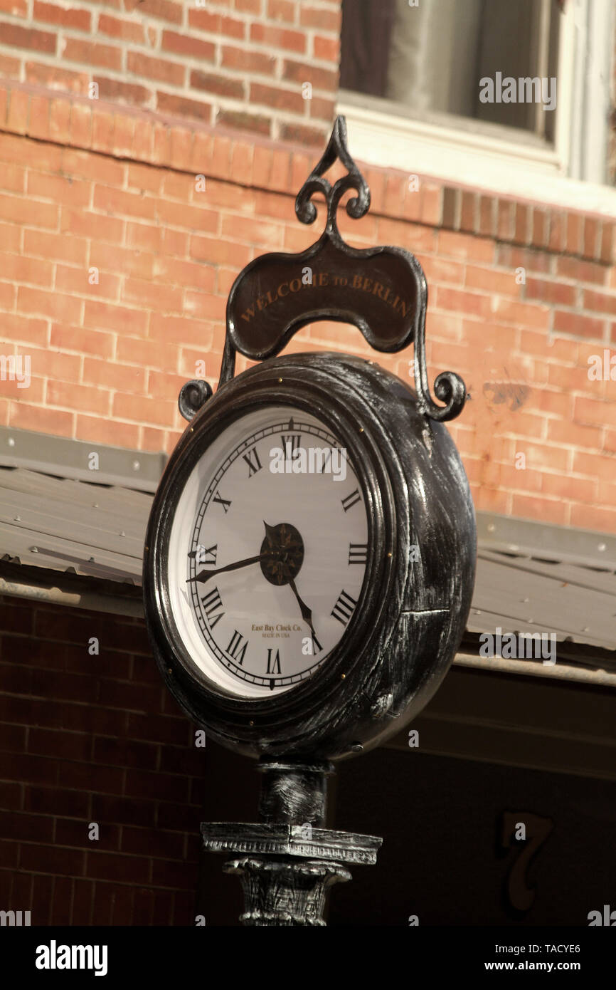 Post clock in downtown Berlin, MD, USA Stock Photo - Alamy