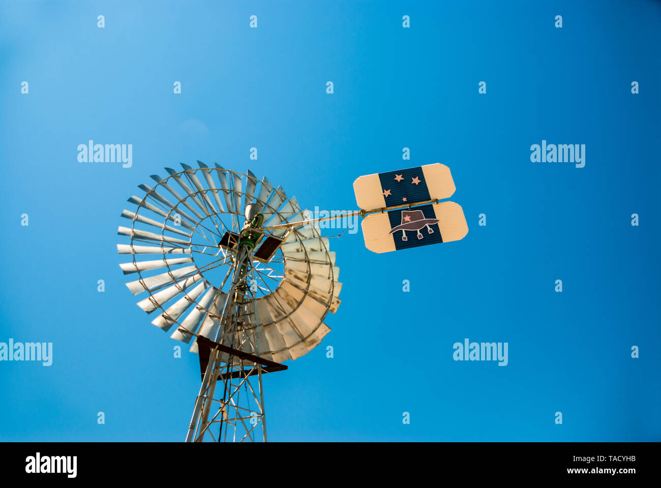 The windmill in the paddock, Queensland, Australia. Windmills are ...