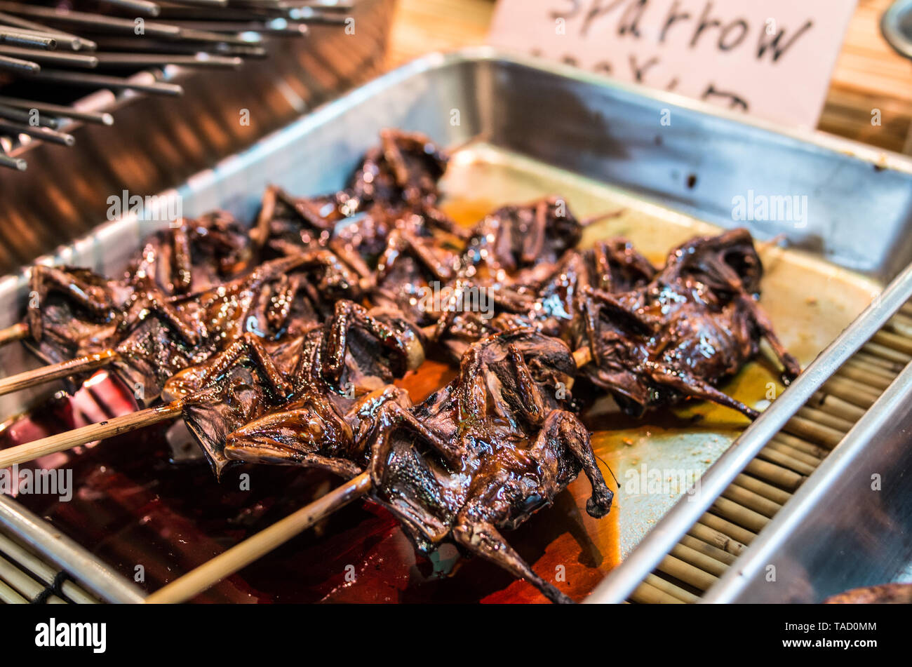 Sparrow on a stick japan Food Stock Photo - Alamy