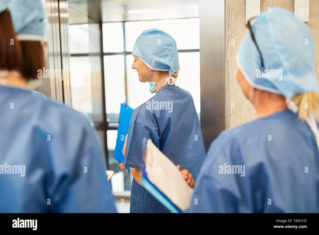 Group of surgeons in emergency room at the hospital in blue surgical ...