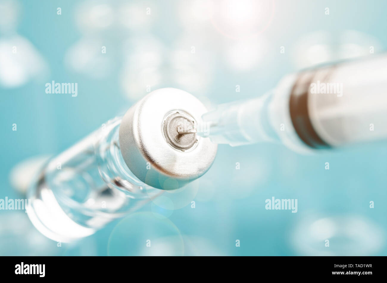 Vaccine vial dose with needle syringe, medical concept vaccination in ...