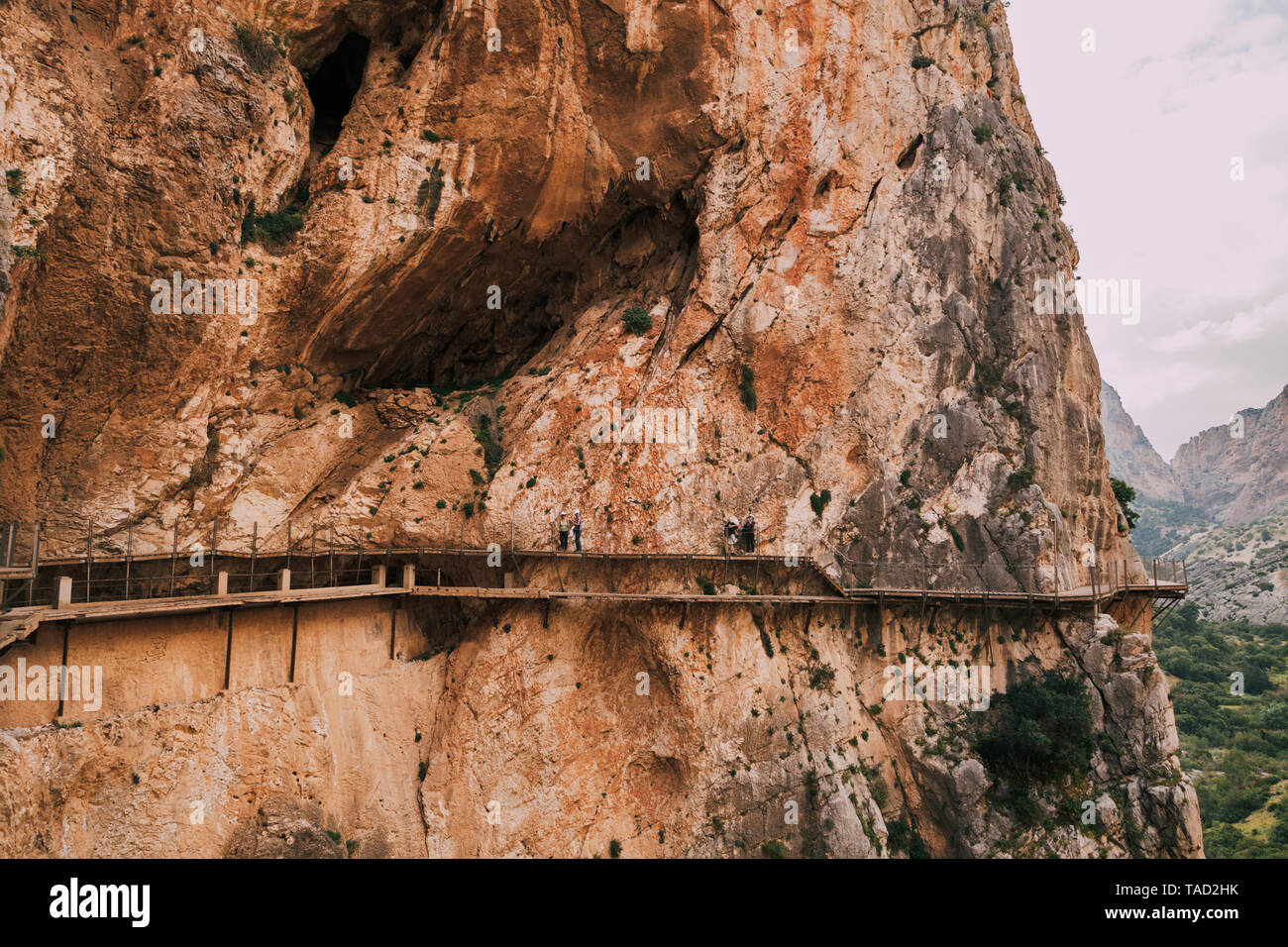 Wooden walkway among rock mountains in south of Spain and runway on the ...