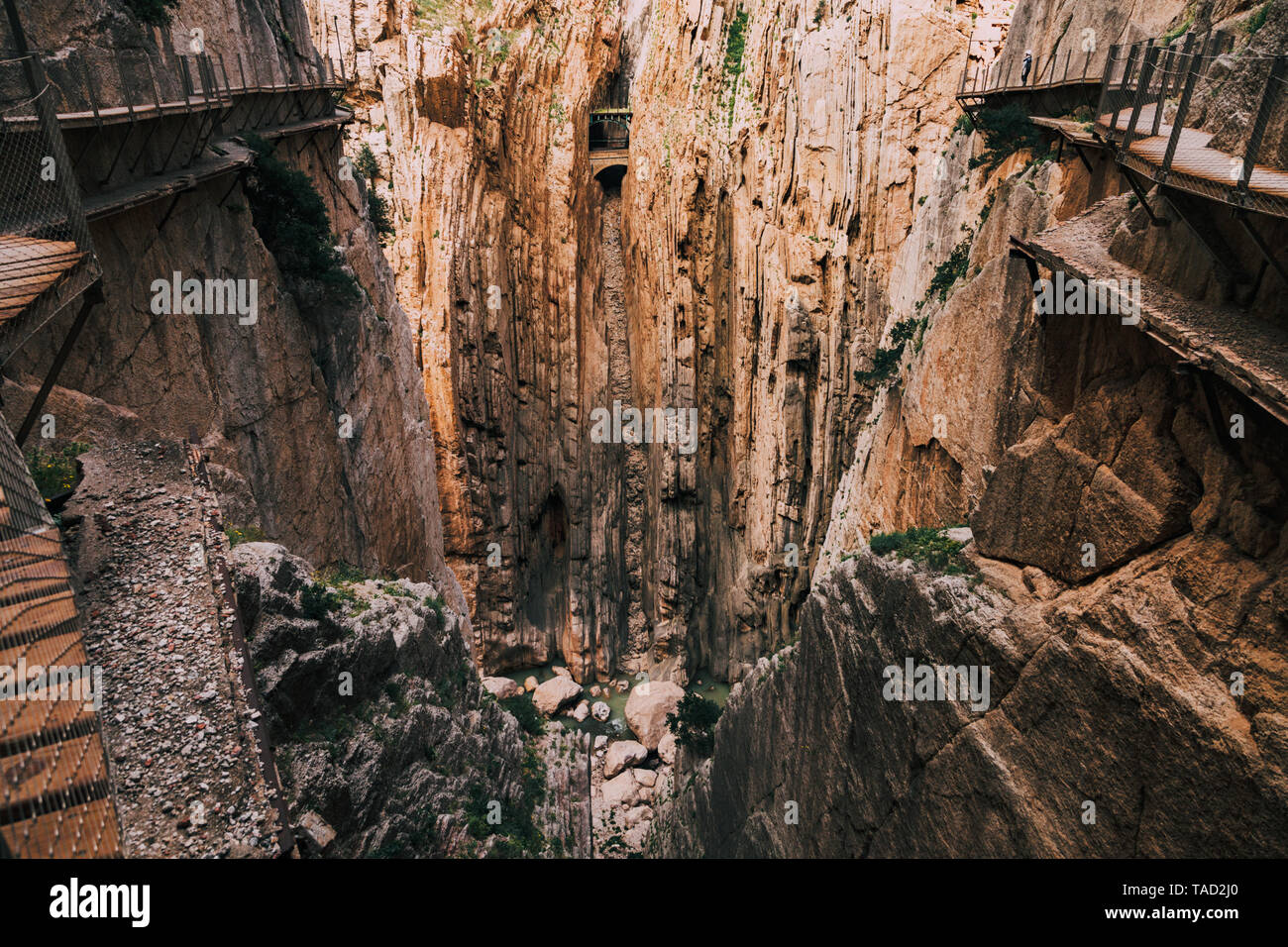 Wooden walkway among rock mountains in south of Spain and runway on the ...