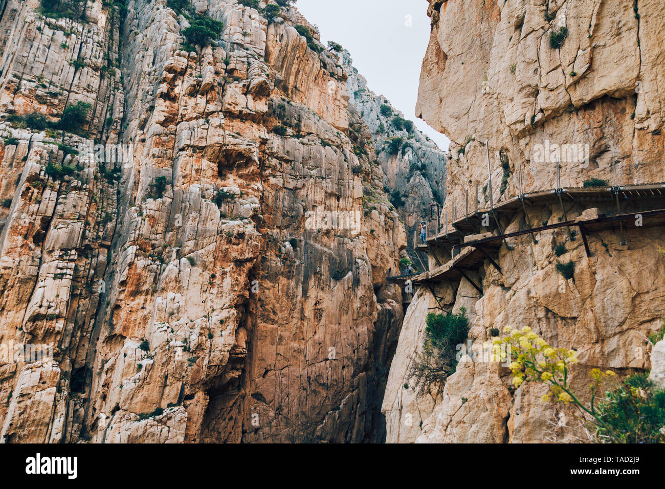 Wooden walkway among rock mountains in south of Spain and runway on the ...