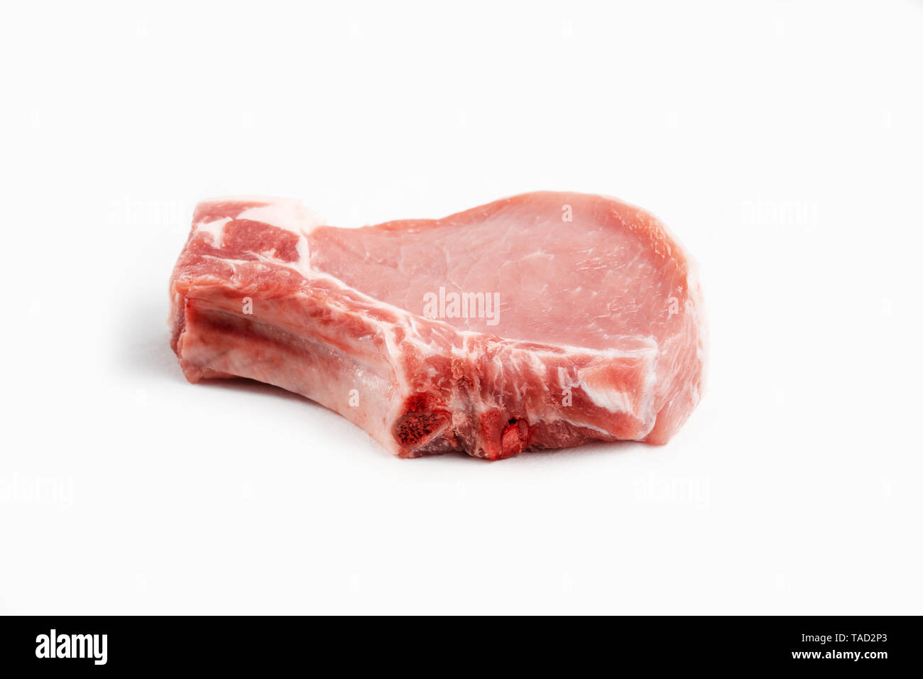 Raw pork meat isolated on white background with clipping path One slice ...