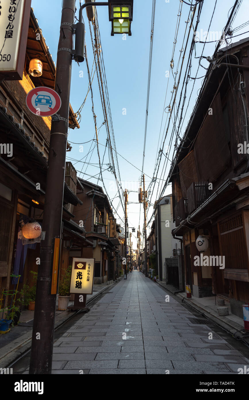 Street view of traditional architecture with blue sky in Kyoto, Japan ...