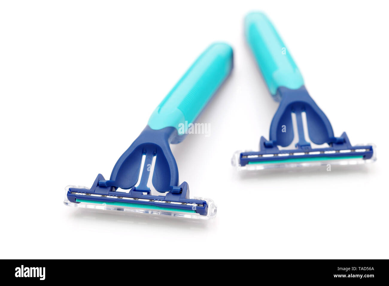 blue disposable shaving razor on white background Stock Photo - Alamy