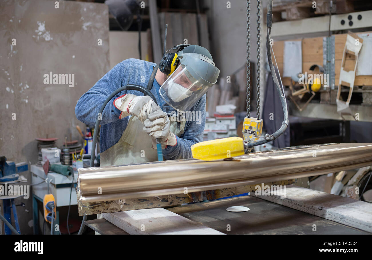 Metal polishing machine hi-res stock photography and images - Alamy