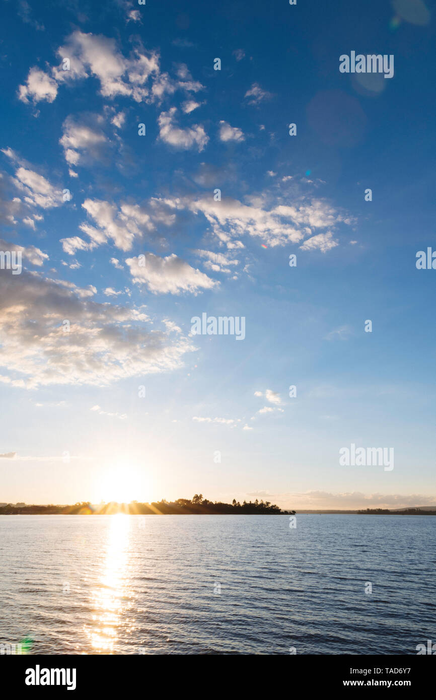 City on the horizon during sunset Stock Photo - Alamy