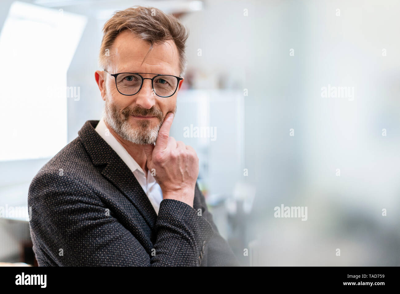Confident office executive hi-res stock photography and images - Alamy