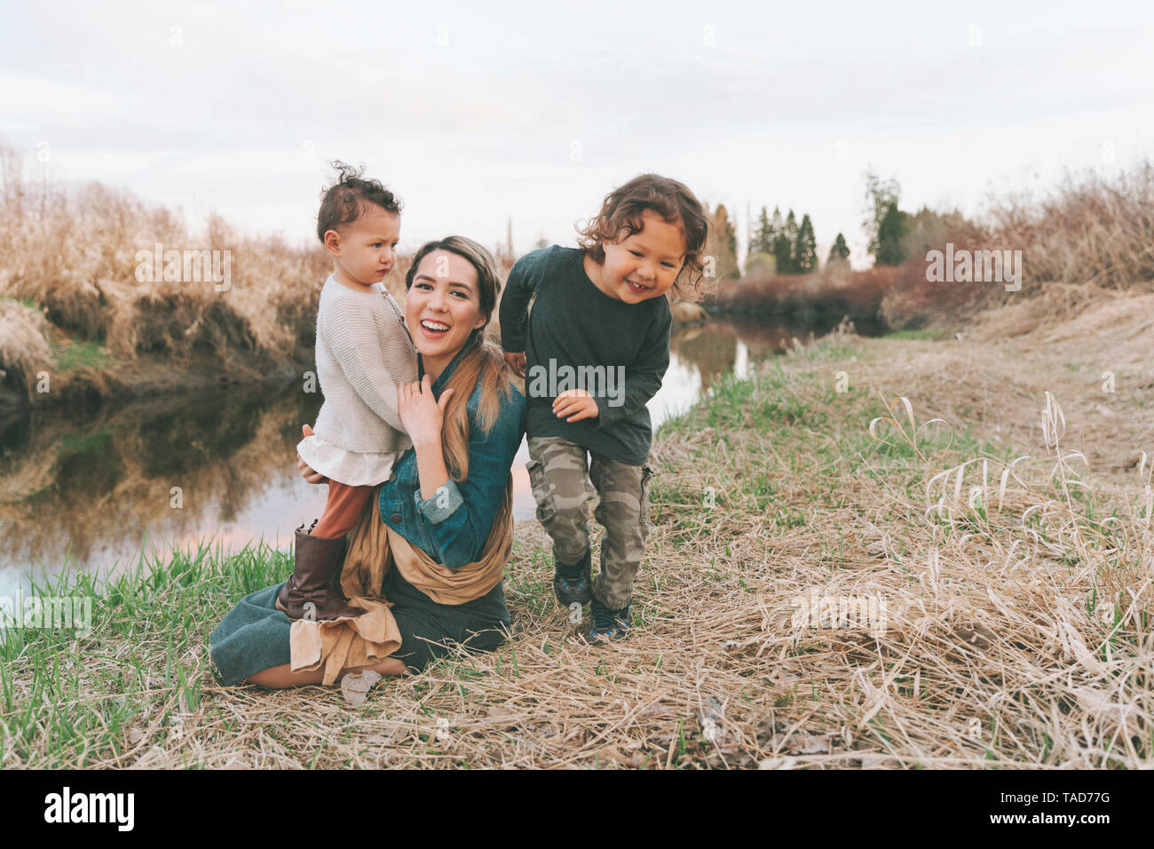 Mother and her children enjoying nature Stock Photo - Alamy
