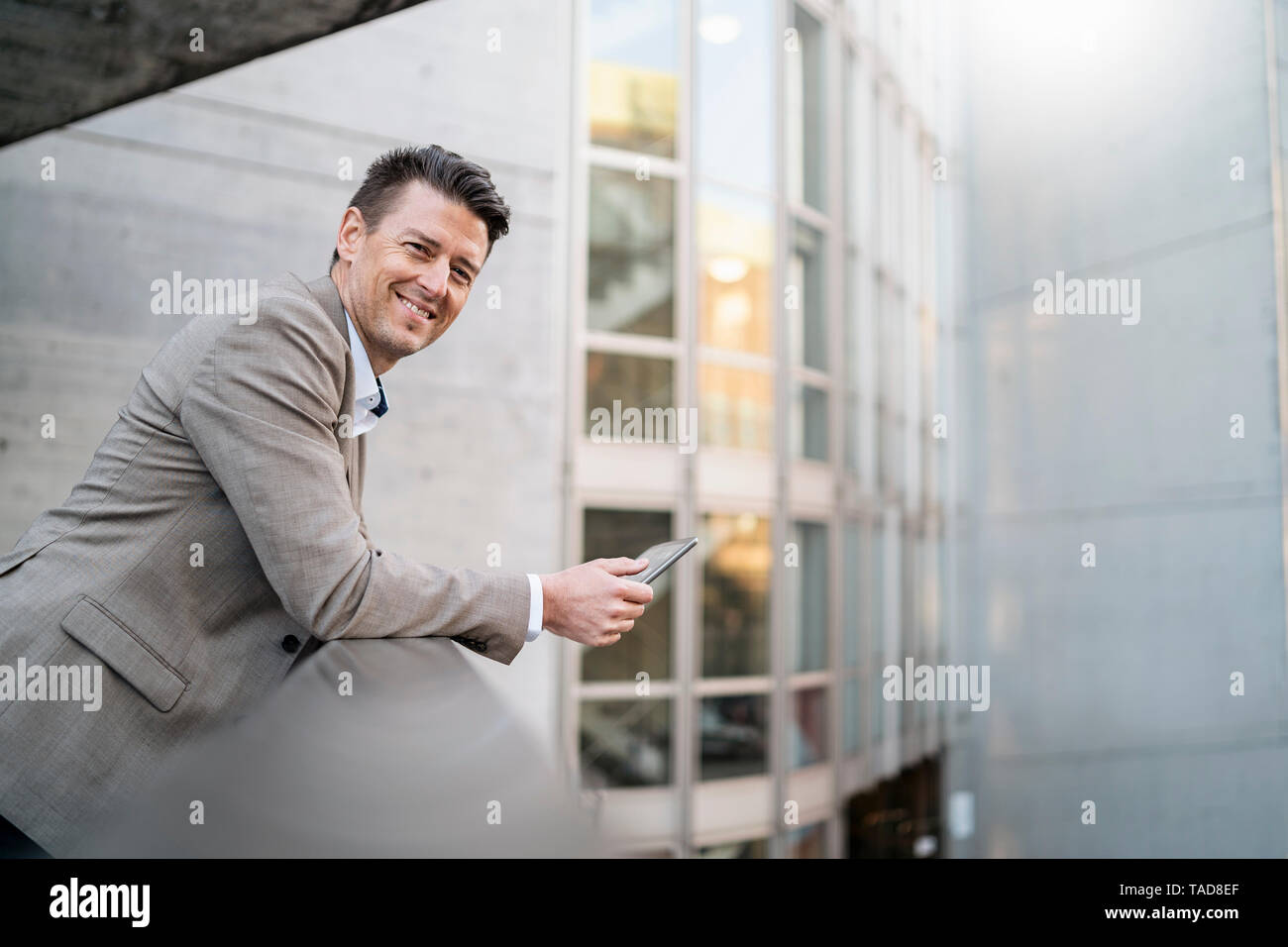 Tablet leaning hi-res stock photography and images - Alamy