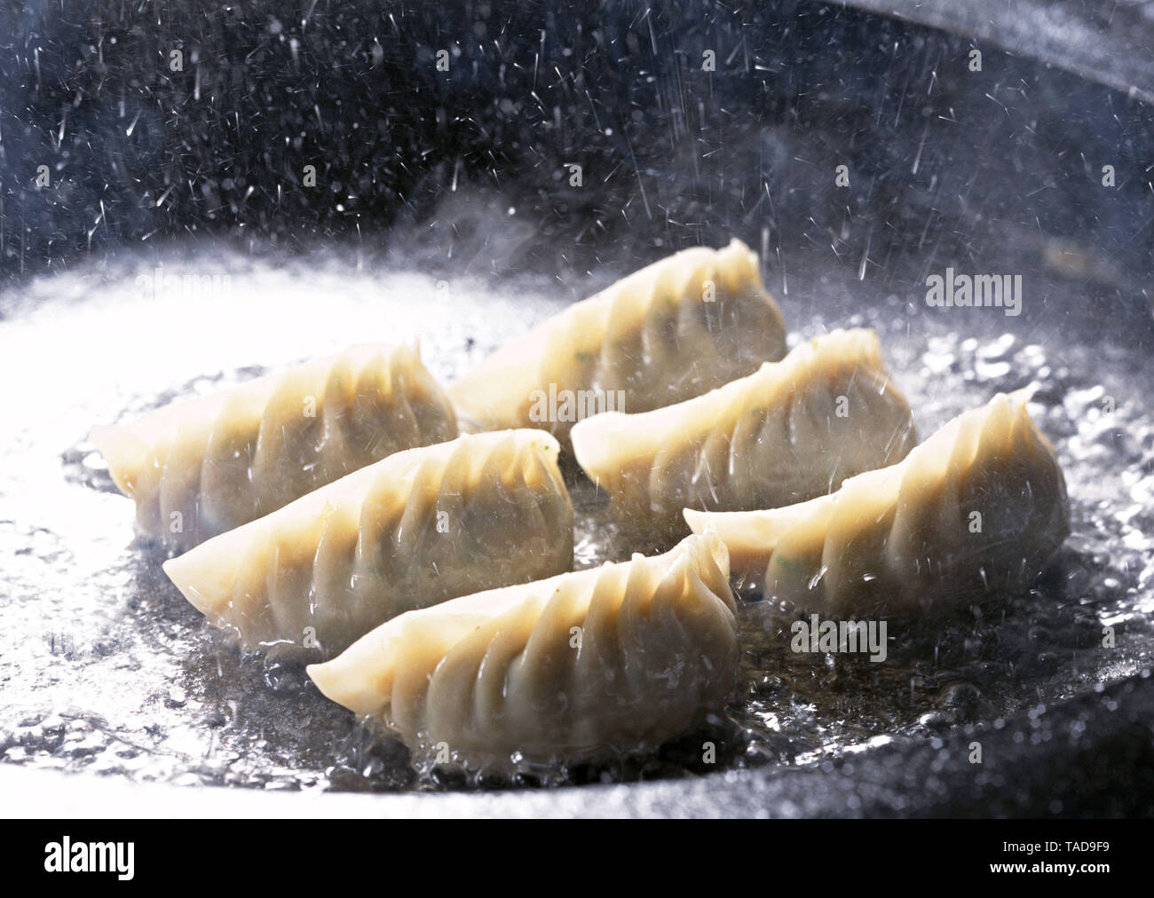 the process of cooking unique and attractive Asian food Stock Photo - Alamy