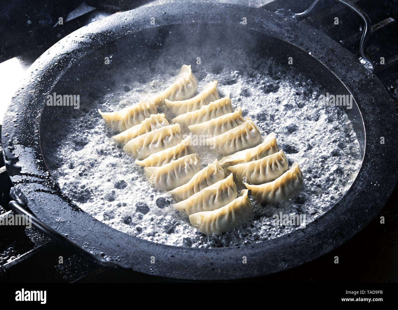 the process of cooking unique and attractive Asian food Stock Photo - Alamy