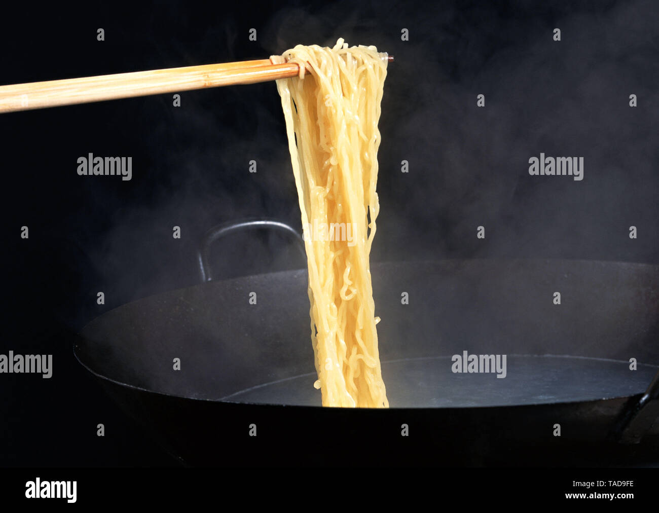 the process of cooking noodles Stock Photo - Alamy