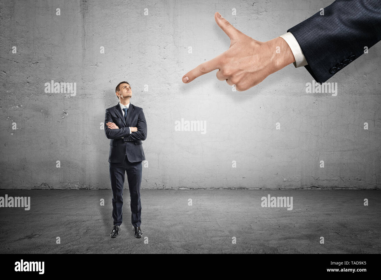 Front full length view of little businessman standing and looking up at ...