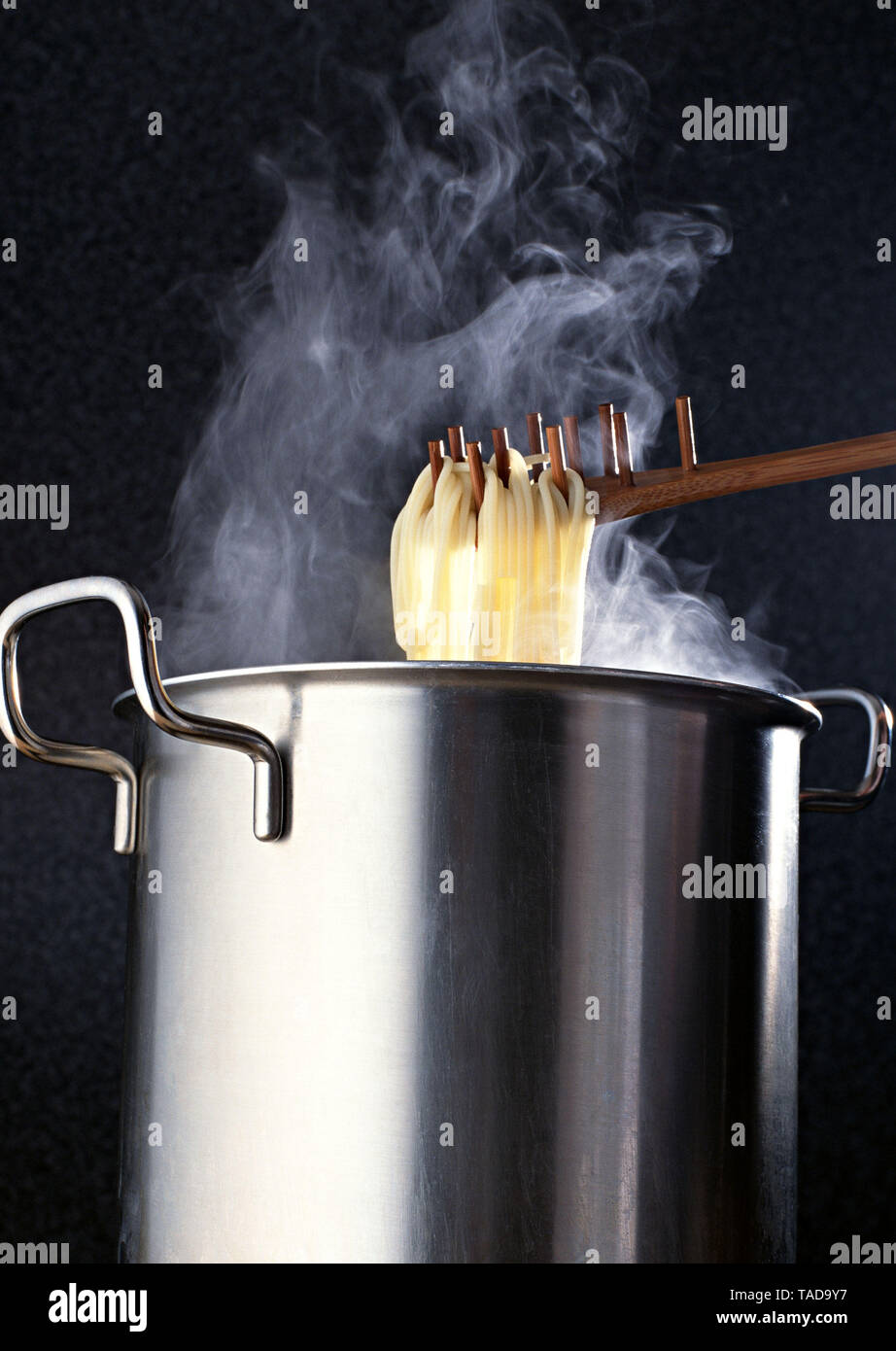 the process of cooking noodles Stock Photo - Alamy
