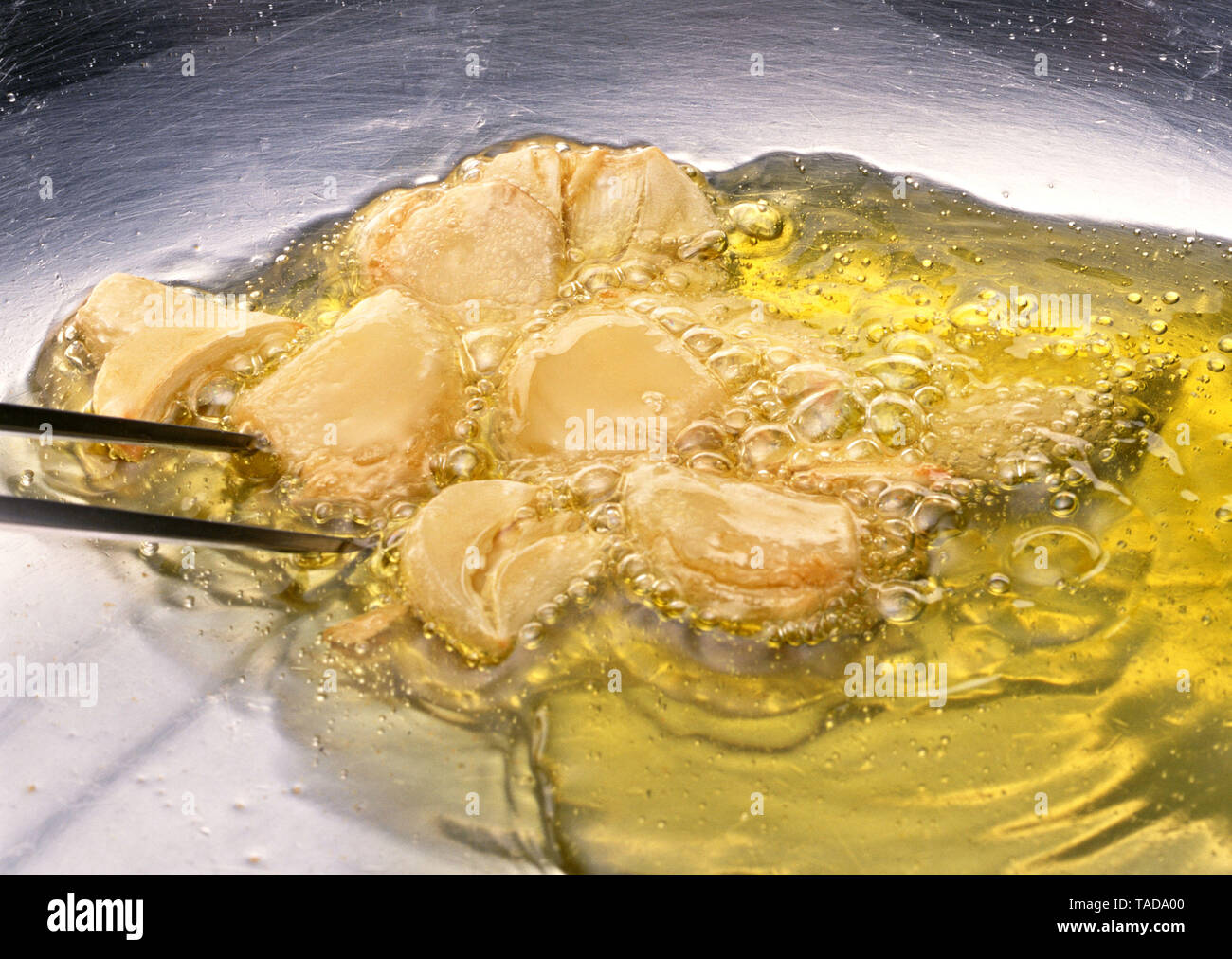 Deep frying machine hi-res stock photography and images - Alamy