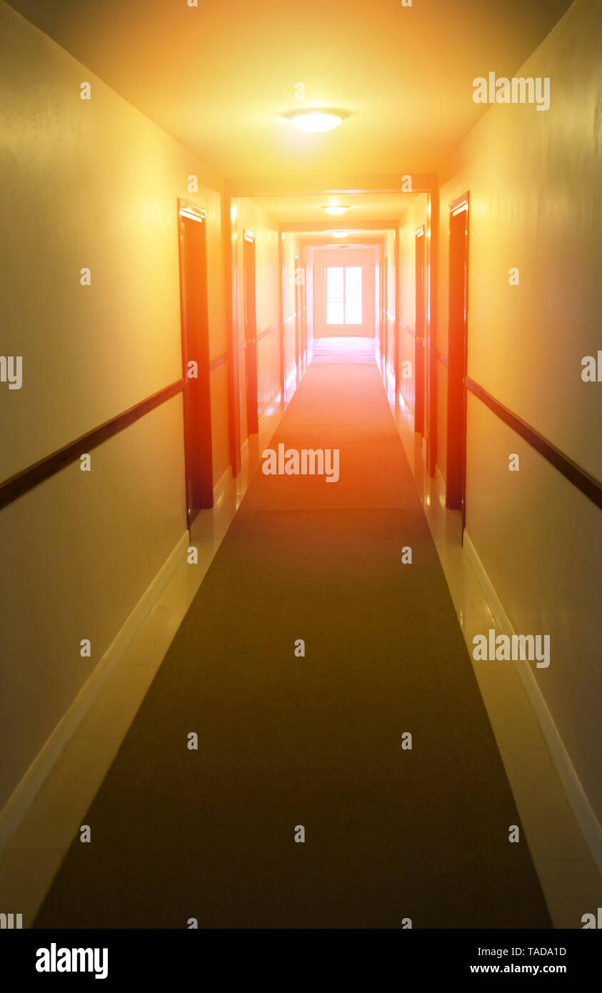 Long corridor of the building walkway / Light at the end of the ...