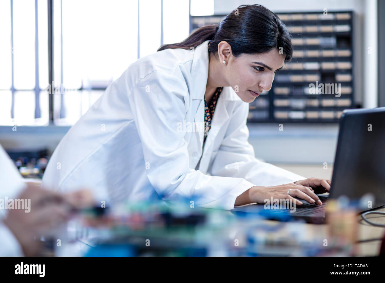 Woman in workshop using hi-res stock photography and images - Alamy