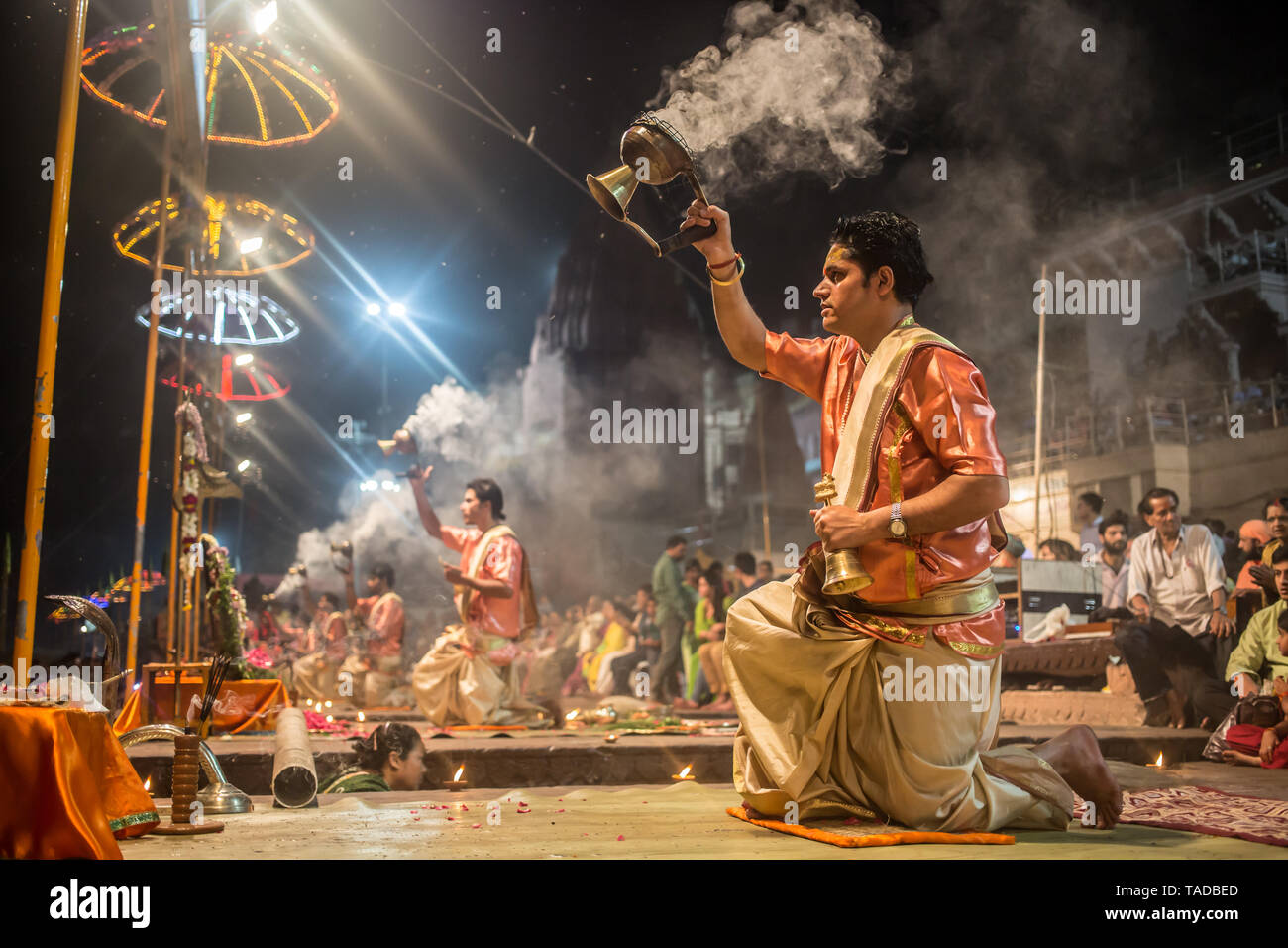 A Hindu ceremony in Varanasi at night next to the Ganges river Stock ...