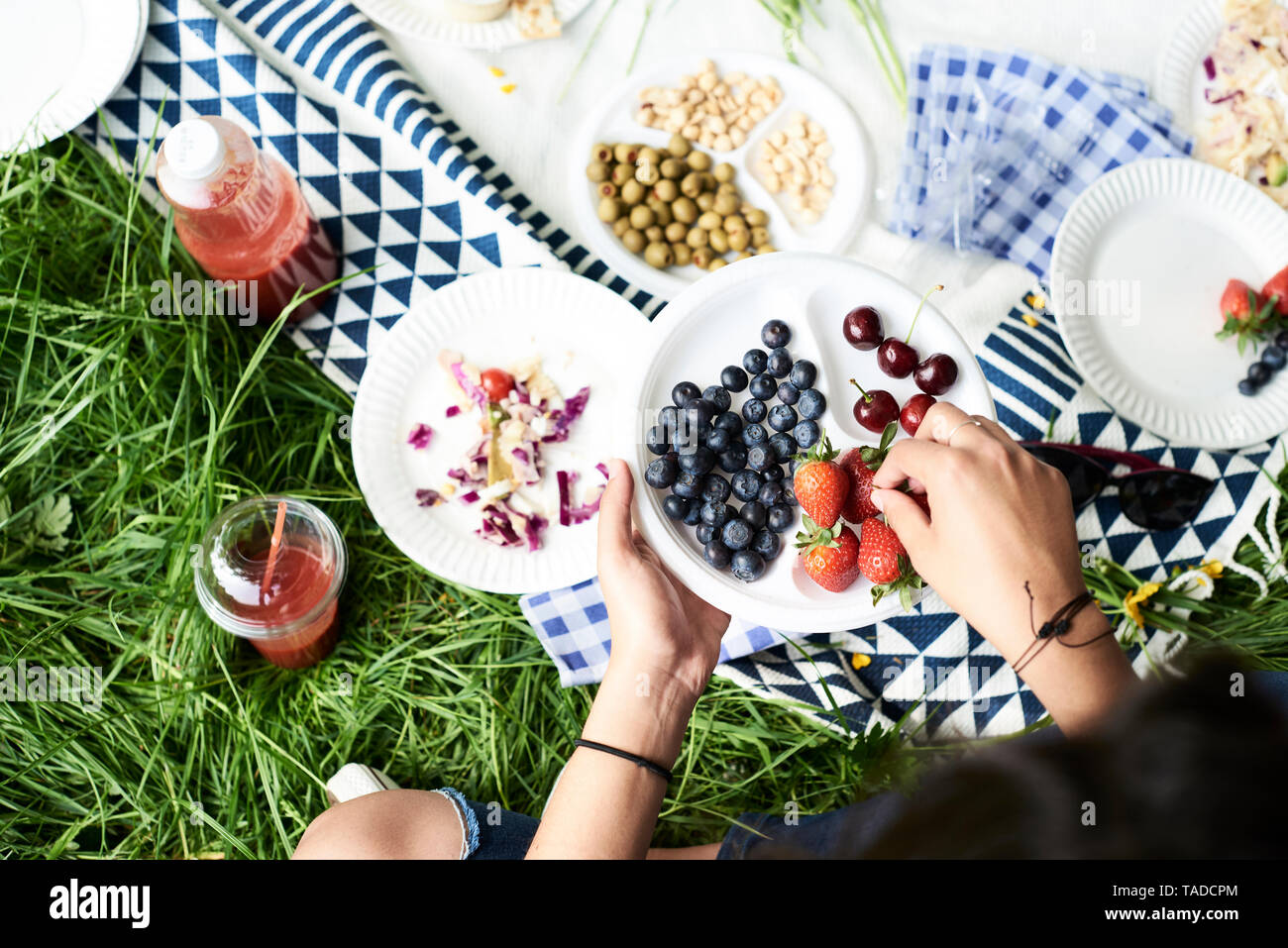 Woman eating picnic hi-res stock photography and images - Alamy