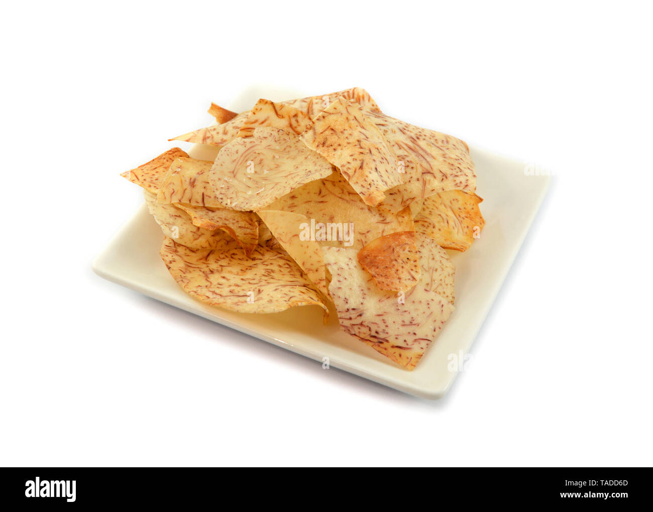 Taro slice fried crispy on plate isolated on white background / Taro ...