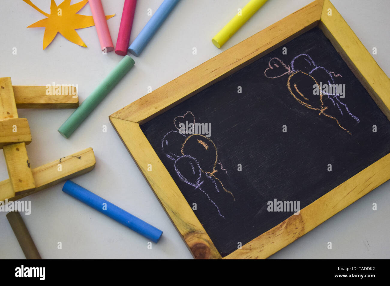 chalkboard with colorful chalk isolated on white background Stock Photo ...
