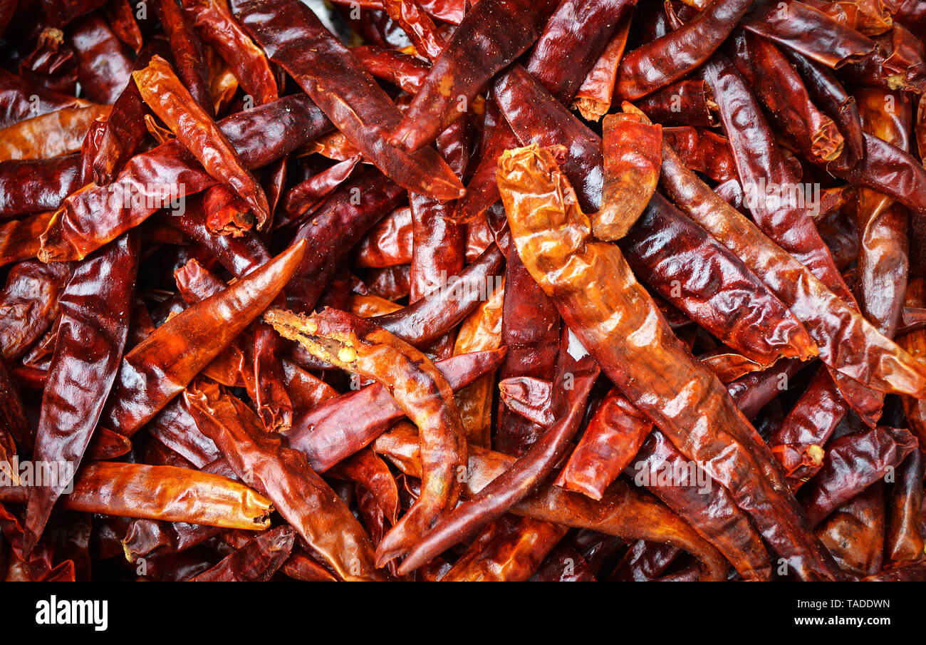 Pile of red dried chilli dry pepper texture background Stock Photo - Alamy