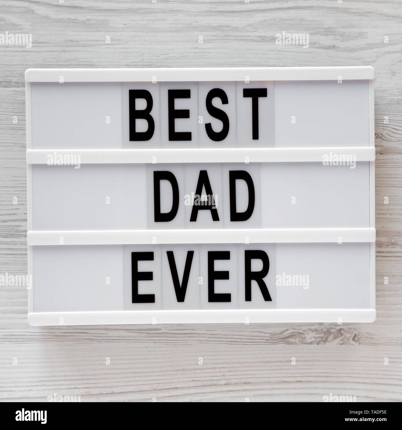 'Best dad ever' words on a modern board over white wooden background ...
