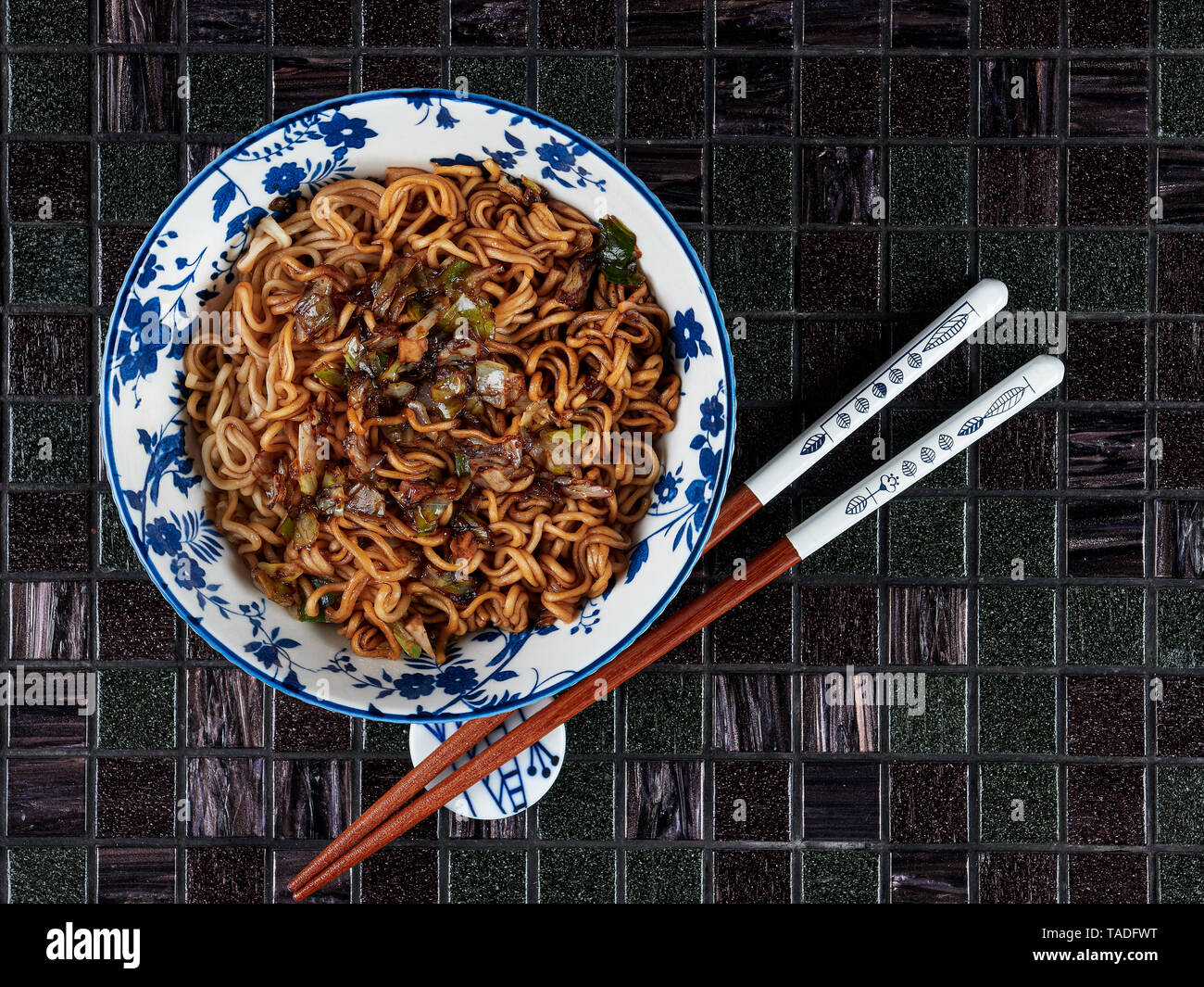Soba Noodles with Yakisoba Sauce, prepared, served in white and blue ...