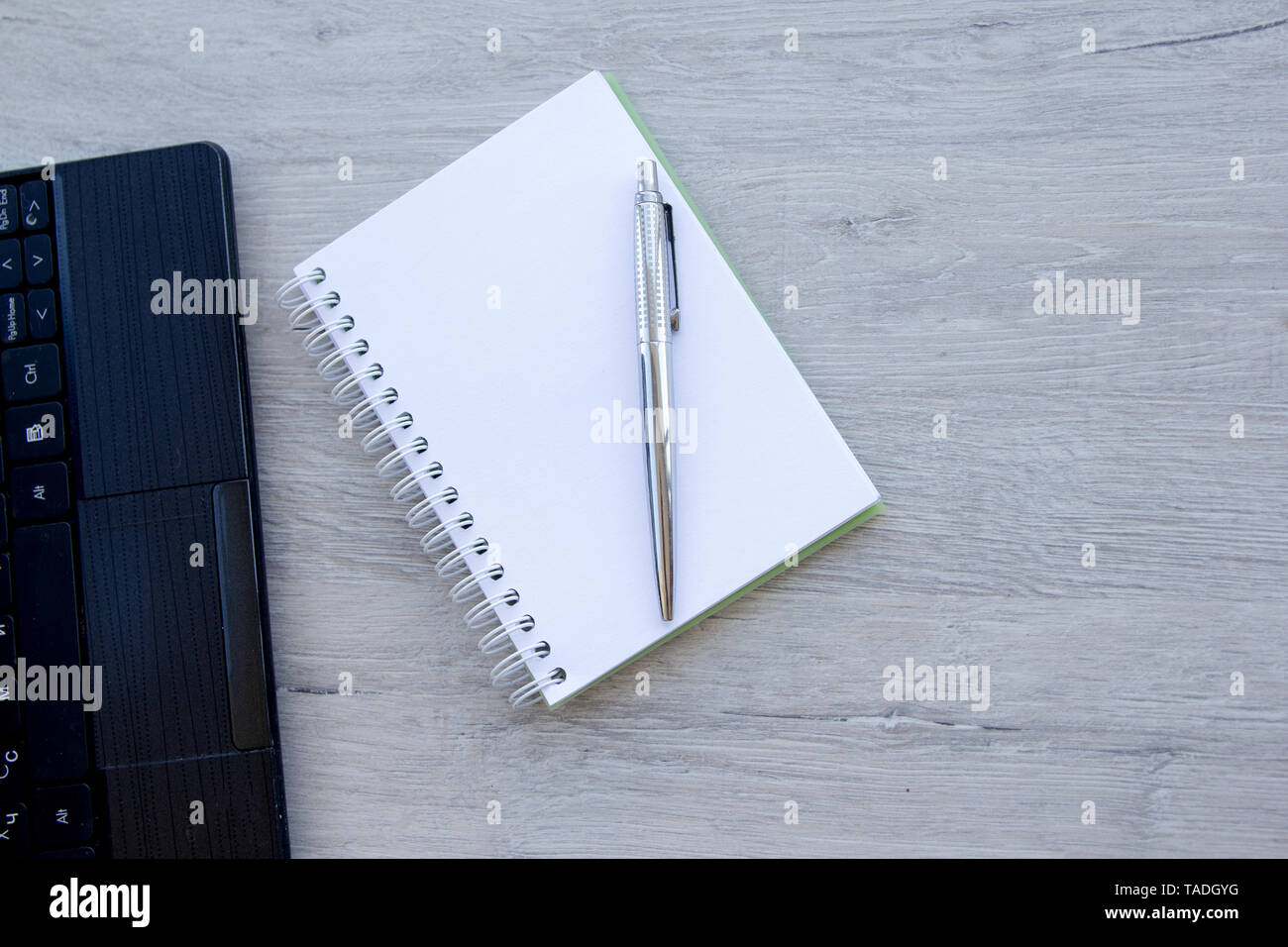 Workplace with notepad notebook, Minimal work space - Creative flat lay ...