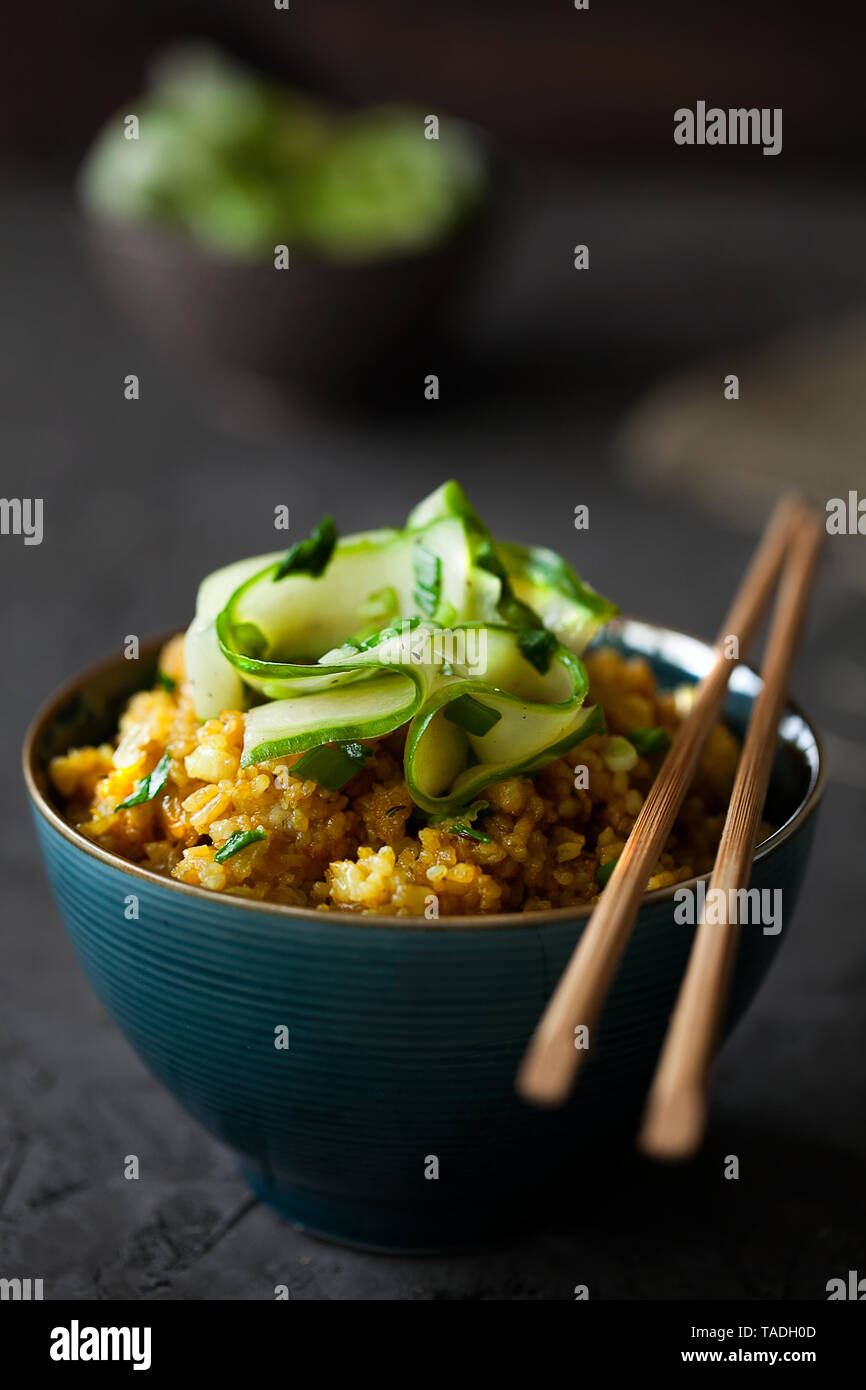 Traditional Burmese or Myanmar fried rice with shallots, turmeric and ...